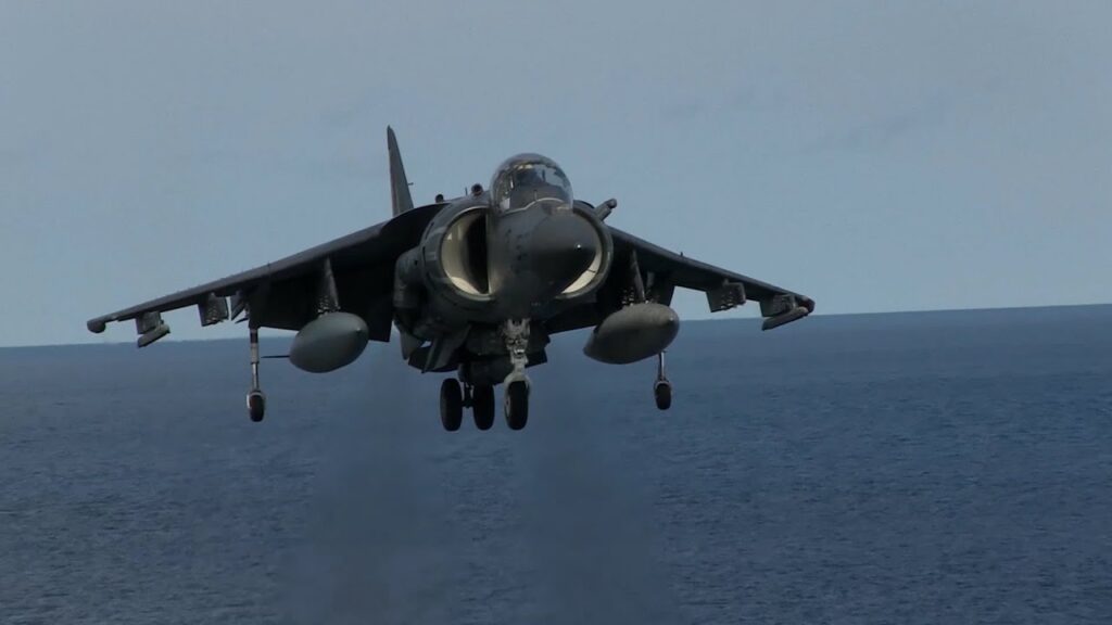 AV-8B Harrier Jets Takeoff and Landing at USS Peleliu During ...
